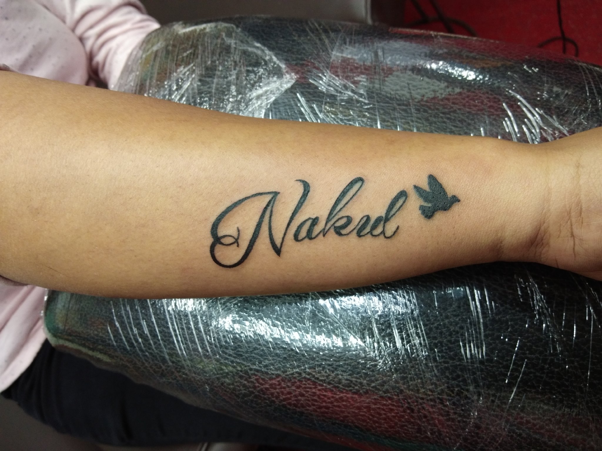 Nikhil Name Tattoo
