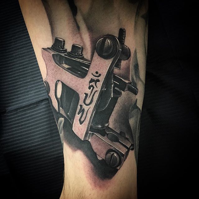 Engraved Gun Tattoo