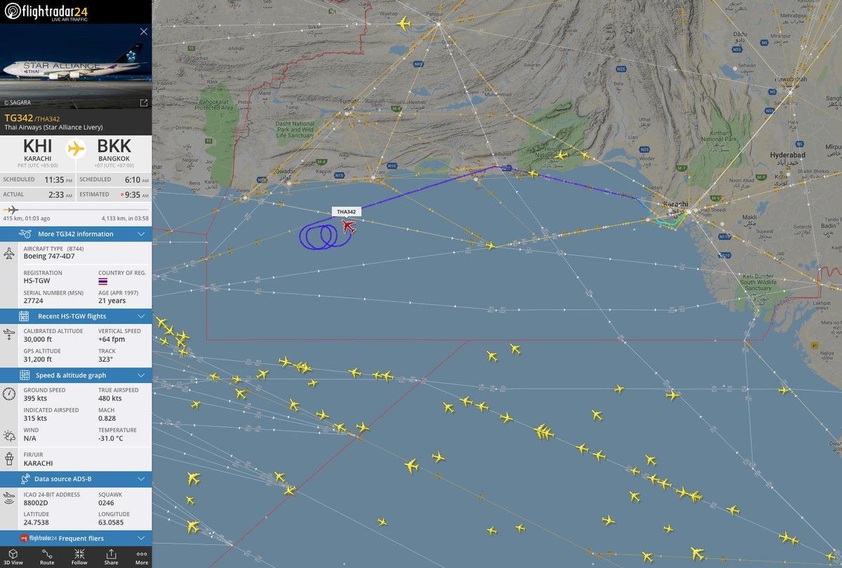 TG342 , Karachi-Bangkok, holding near Karachi about 1 hour after ...
