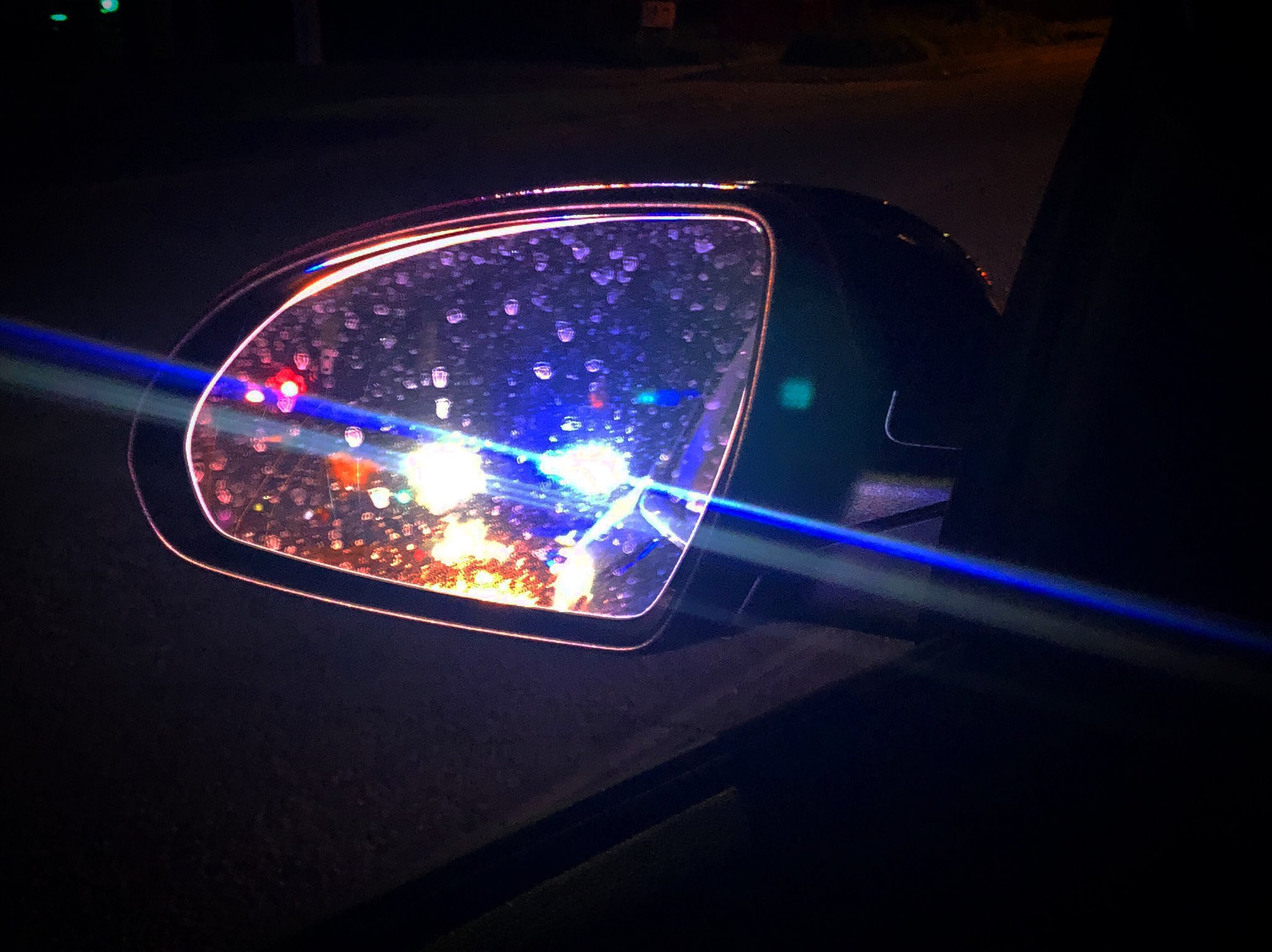 Police Lights At Night From Behind