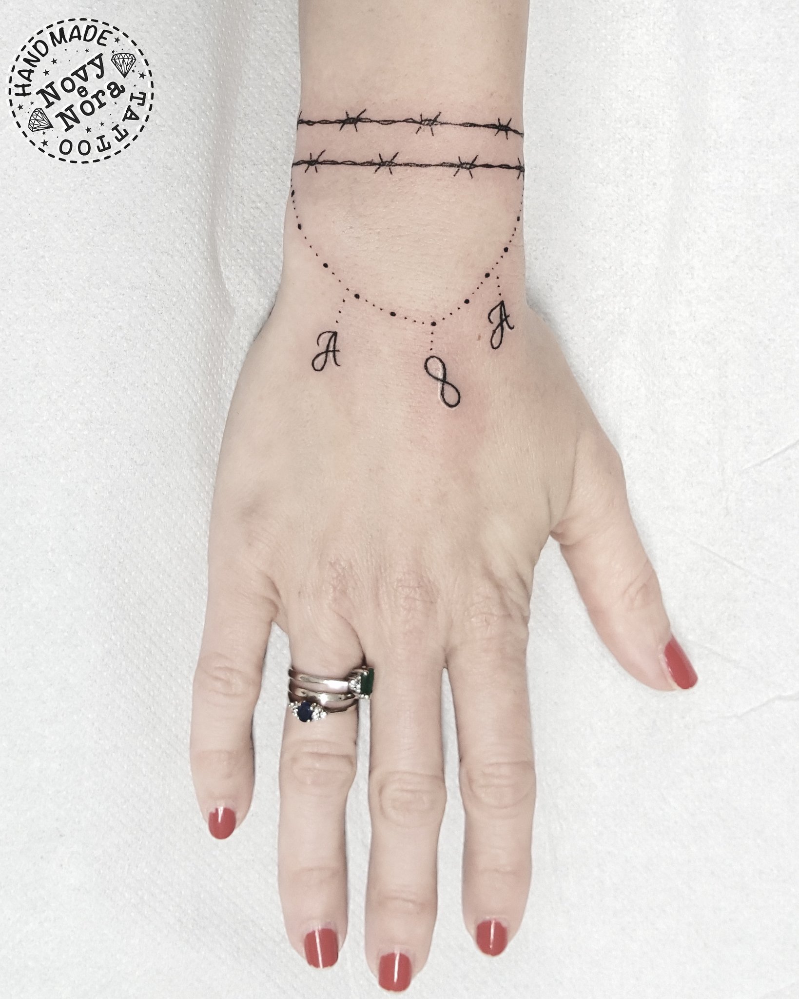 Charm Bracelet Tattoo