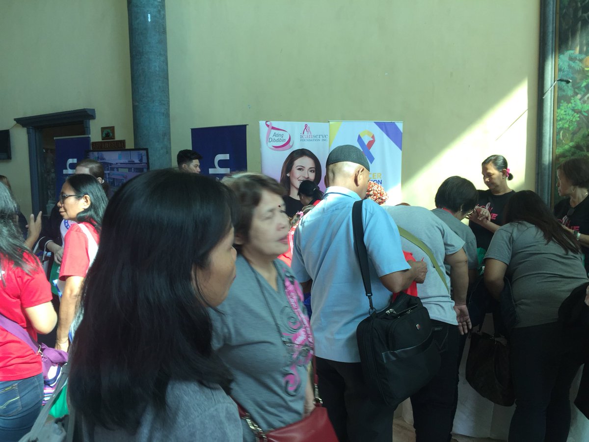 Cancer patients and survivors gather at the afp theatre in camp ...