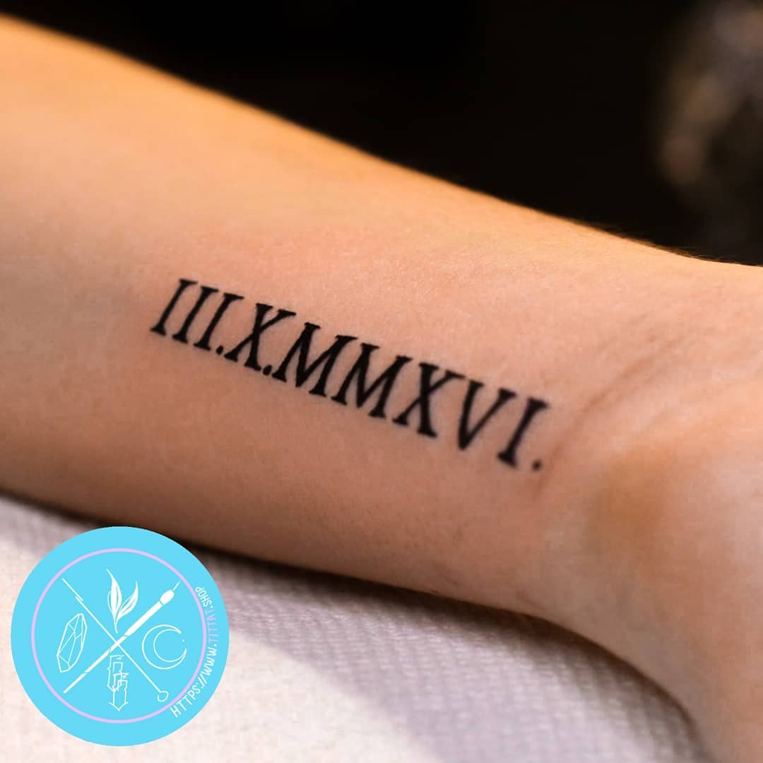 Roman Numeral 9 Tattoo