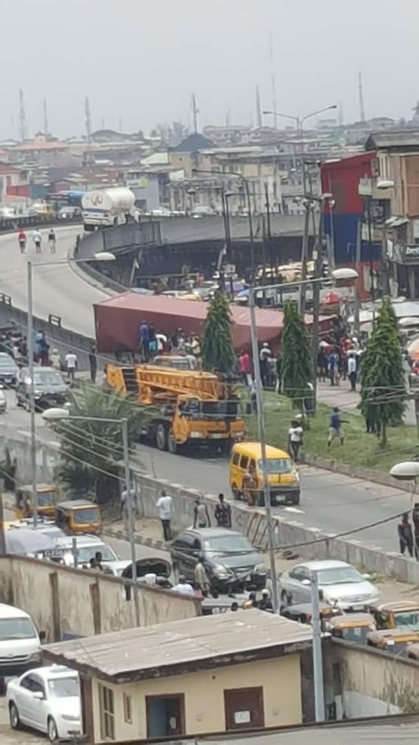 Just In: Another Container Falls On Ojuelegba Bridge (Photos)