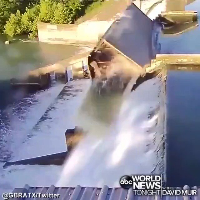 DAM FAILURE: Newly released video shows the moment part of a spillgate ...