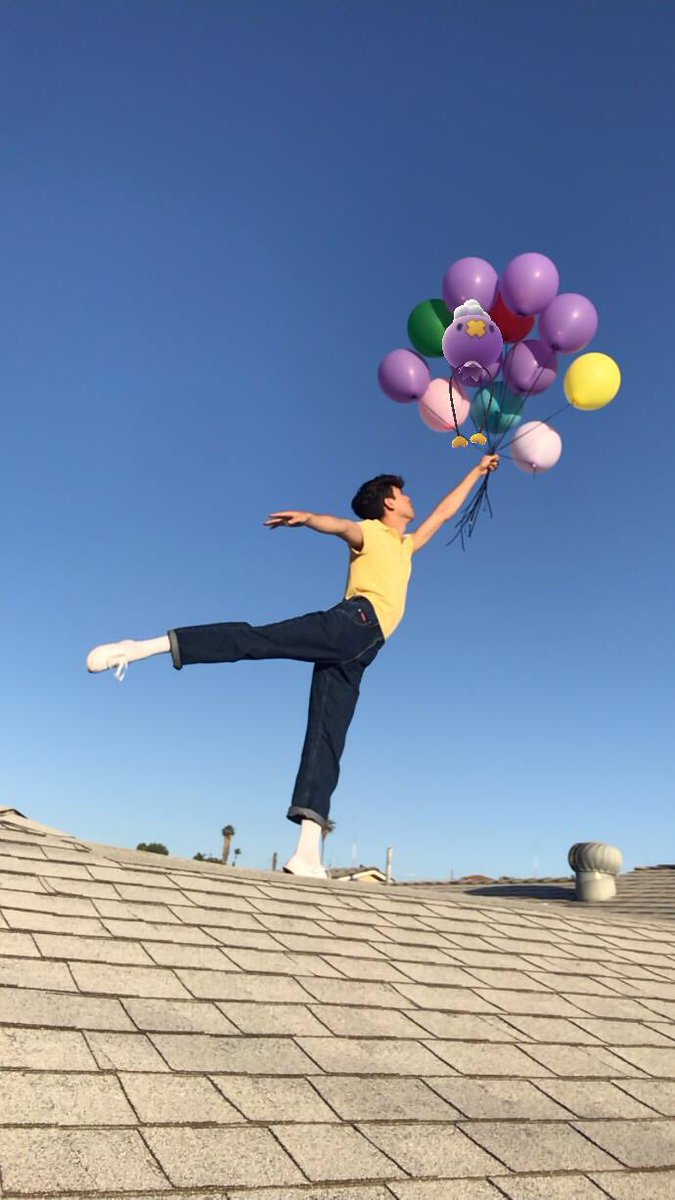 Person Floating With Balloons