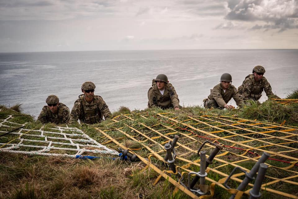 Following in the footsteps of heroes. USArmy soldiers climb the ...