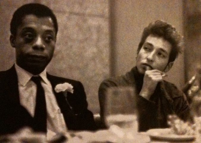 Dylan looking at Baldwin with who's-that-cat admiring envy. All is as ...