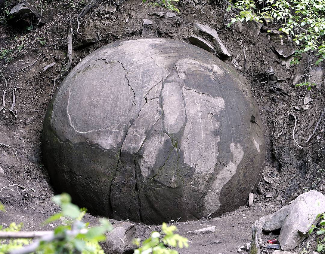 A giant stone ball has been discovered in a forest near the village of ...