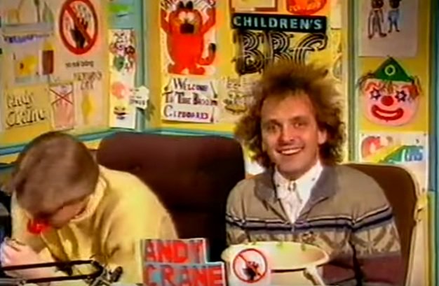 Today we remember RikMayall in the broom cupboard making Andy Crane ...