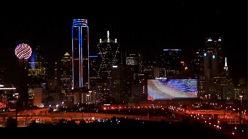Downtown dallas is all red white & blue tonight, honoring our military ...