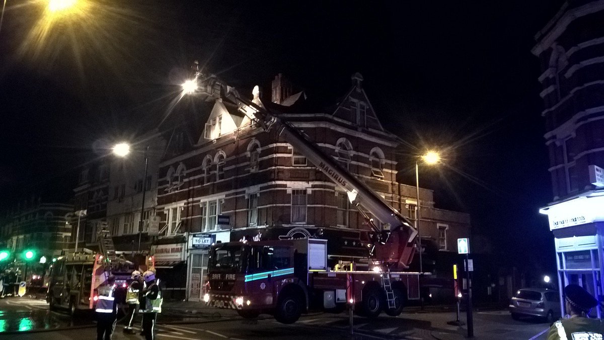 Two people rescued by firefighters following a fire in a flat above a ...