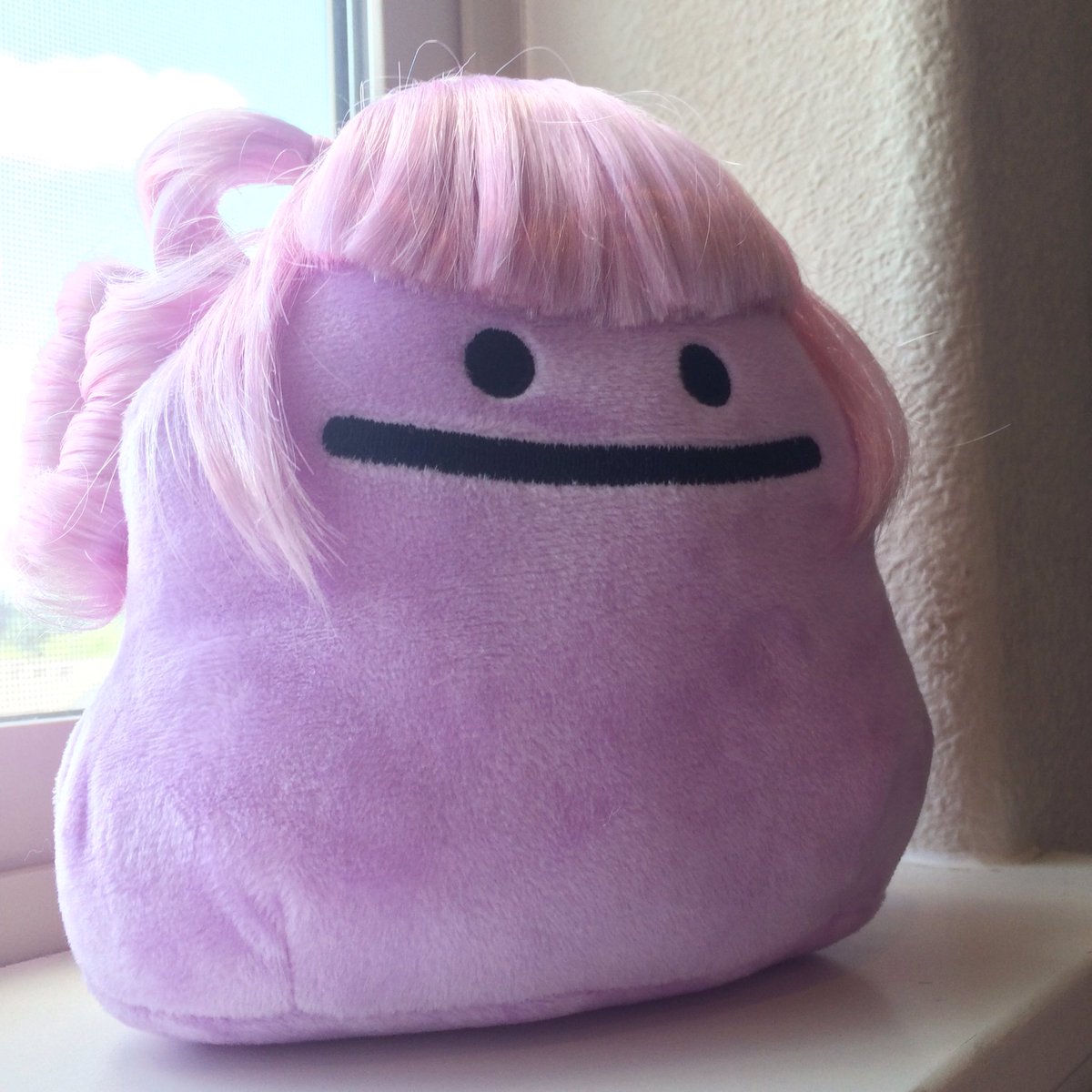 So I was cleaning and I knocked over some doll wigs and one fell onto ...