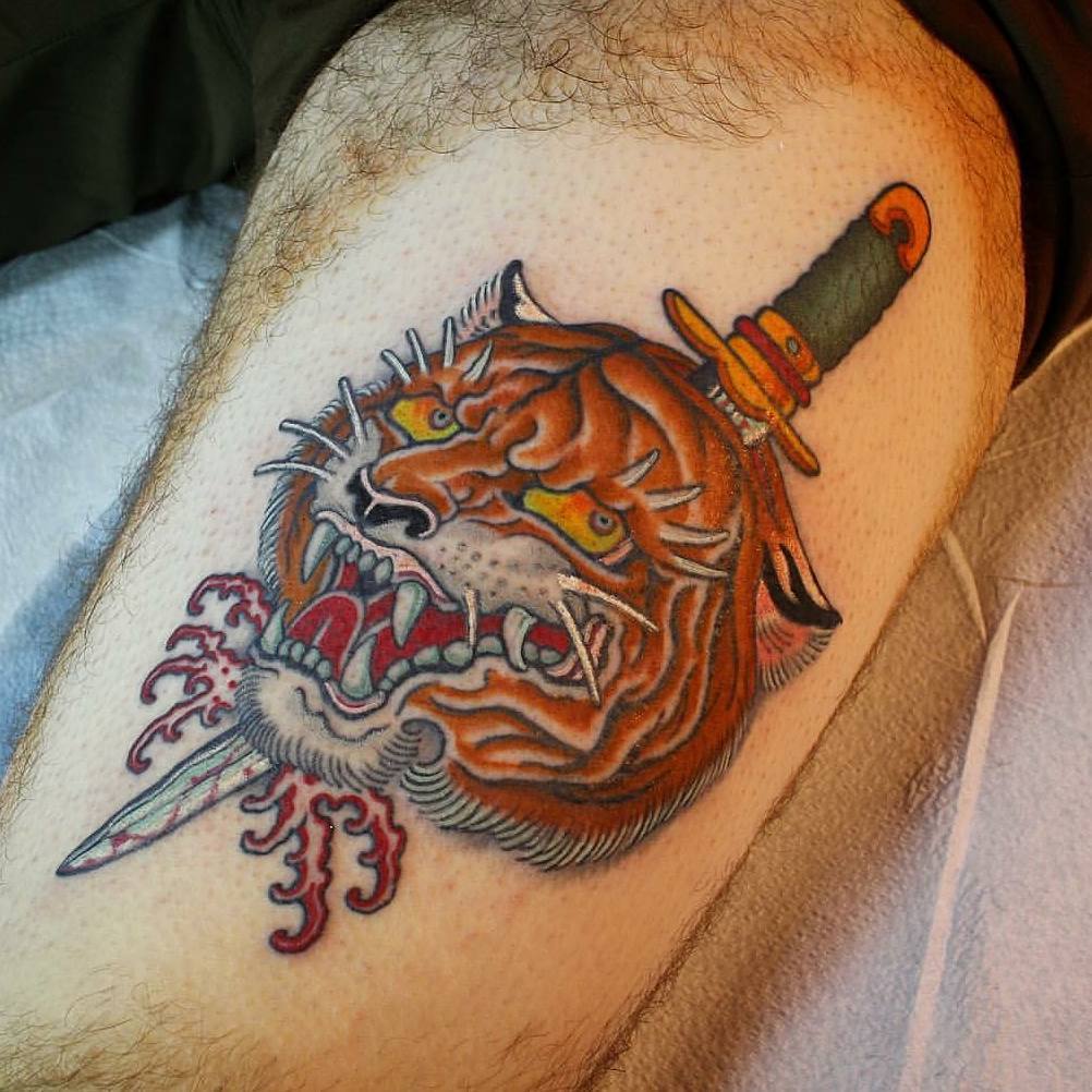Traditional Tiger Head Dagger Tattoo