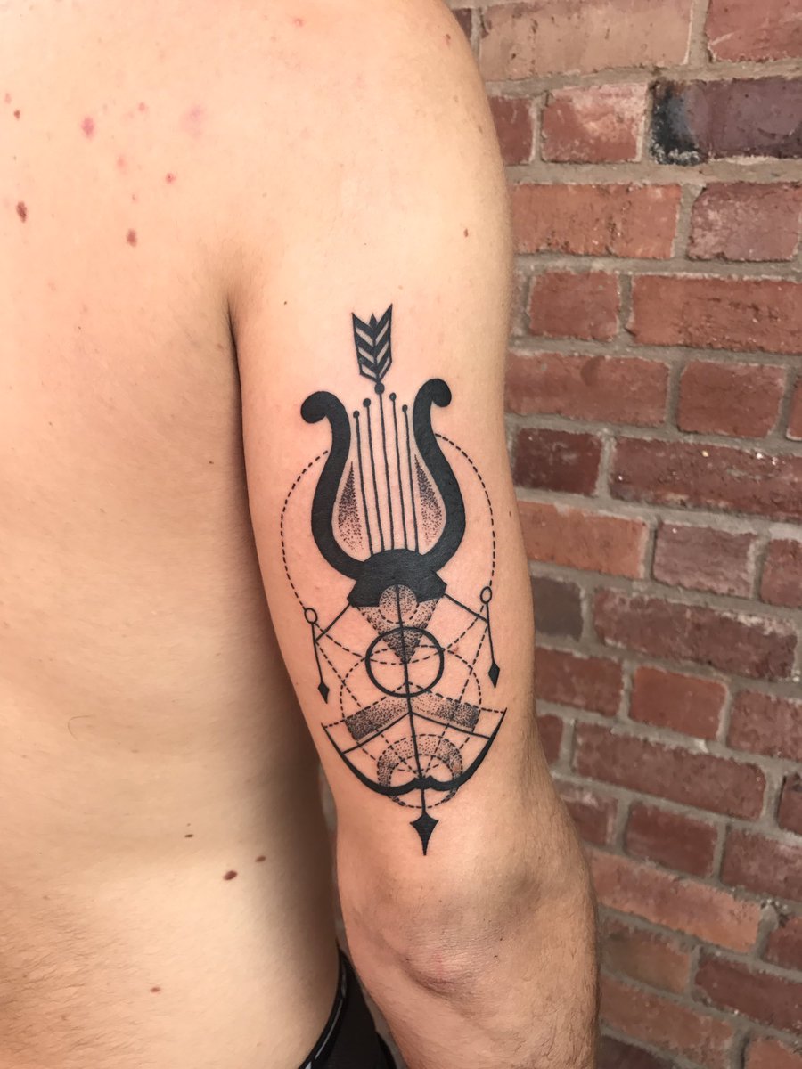 Apollo Symbol Tattoo