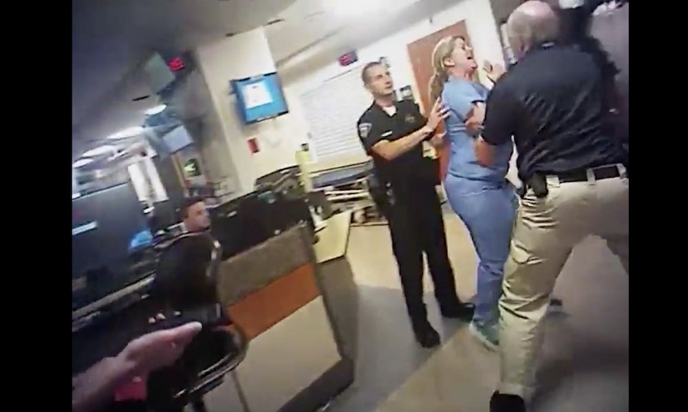 Cop suspended from blood draw program after dragging screaming nurse to ...