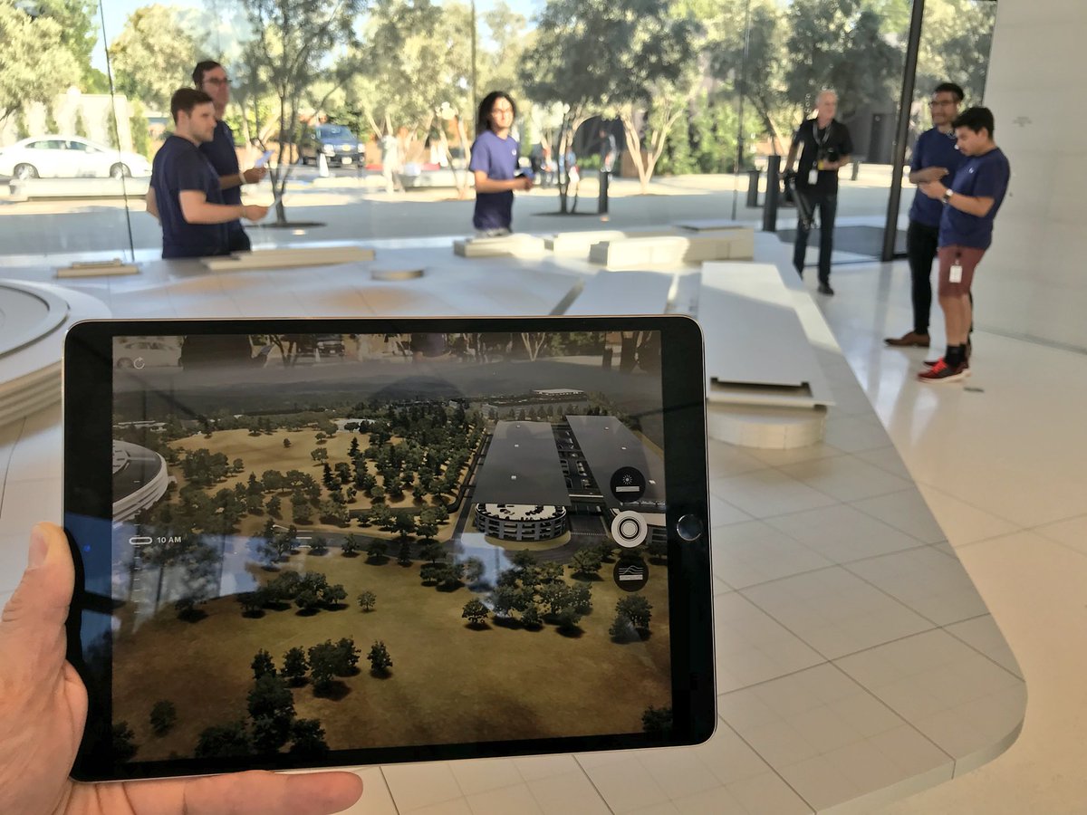 The ar experience with a giant apple park model in the visitor’s center ...