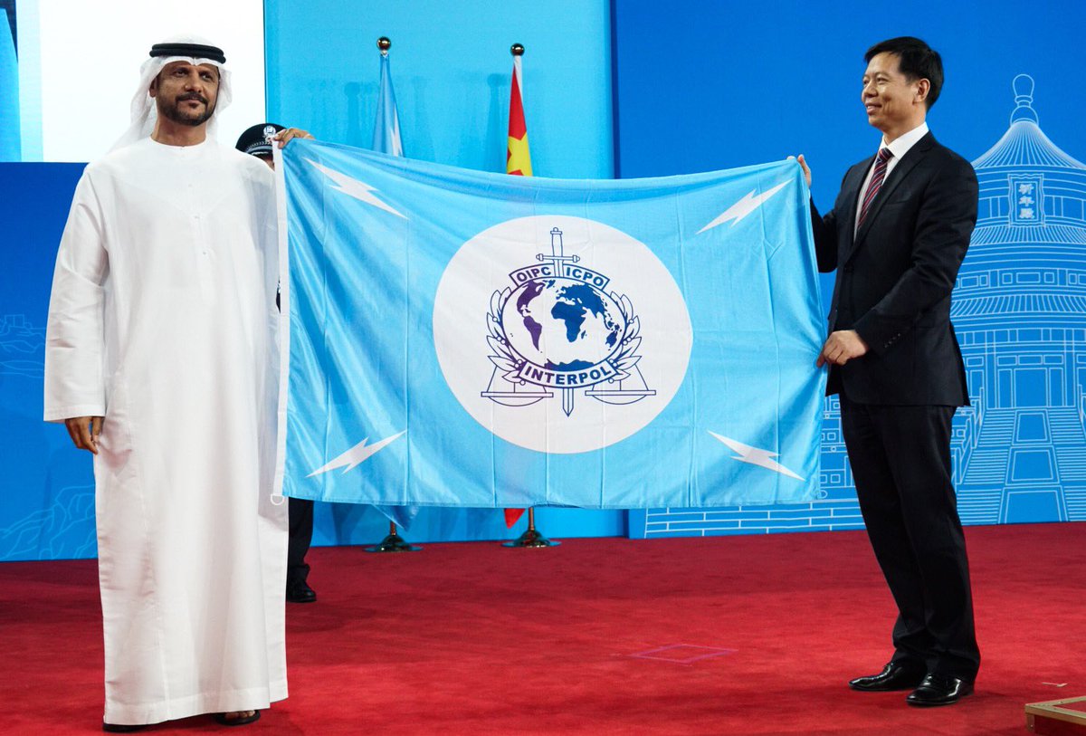 Brigadier Hamid Alamimi of the UAE delegation receives the INTERPOL ...