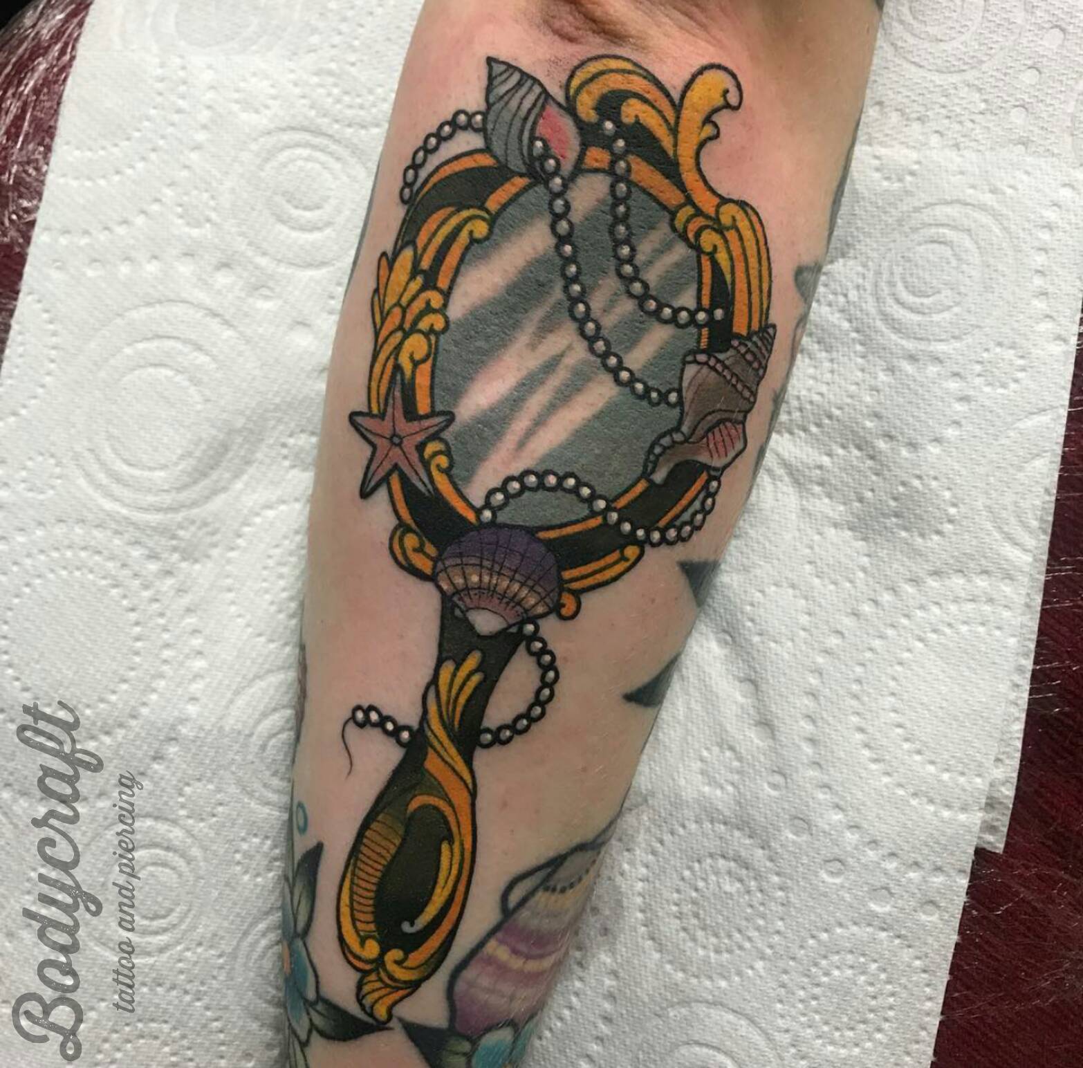 Traditional Mirror Tattoo