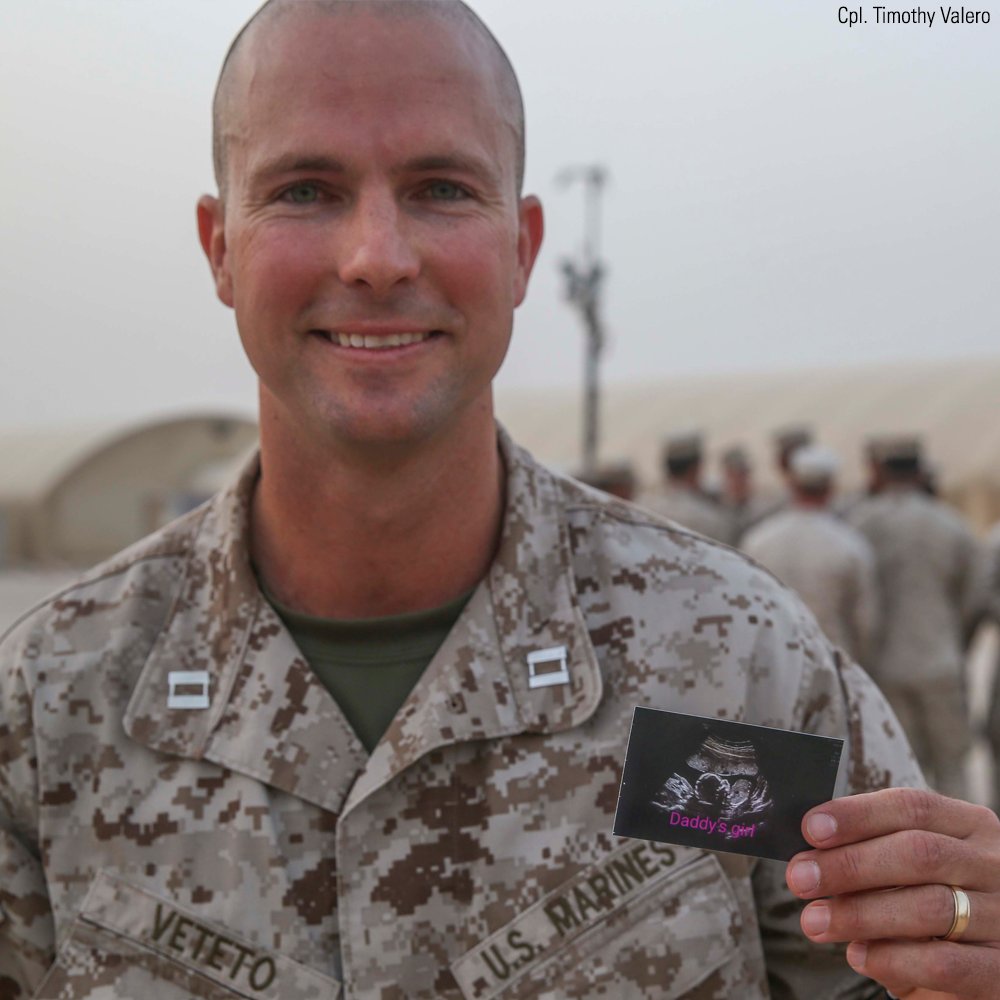 . capt. gregory veteto punts a football sent by his wife revealing the ...