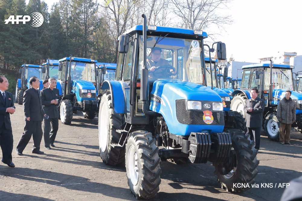 North Korean leader Kim Jong-Un inspects the Kumsong Tractor Factory in ...