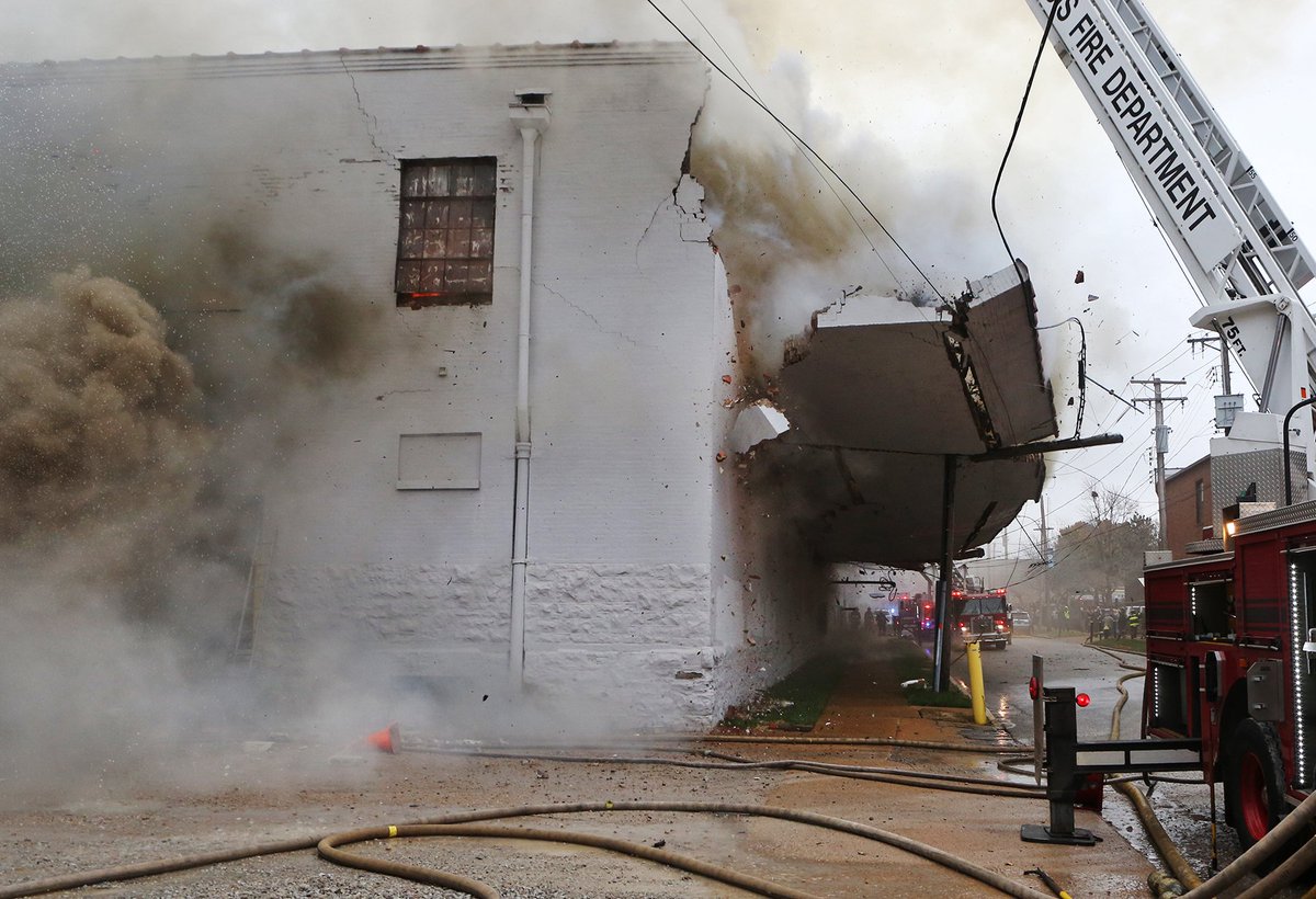 Wall collapses at warehouse fire, smashes fire truck : r/Firefighting