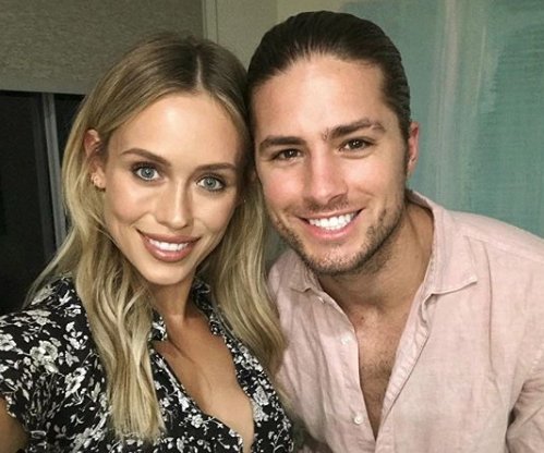 cast mates travis burns and emma lane are married! see all the stunning ...