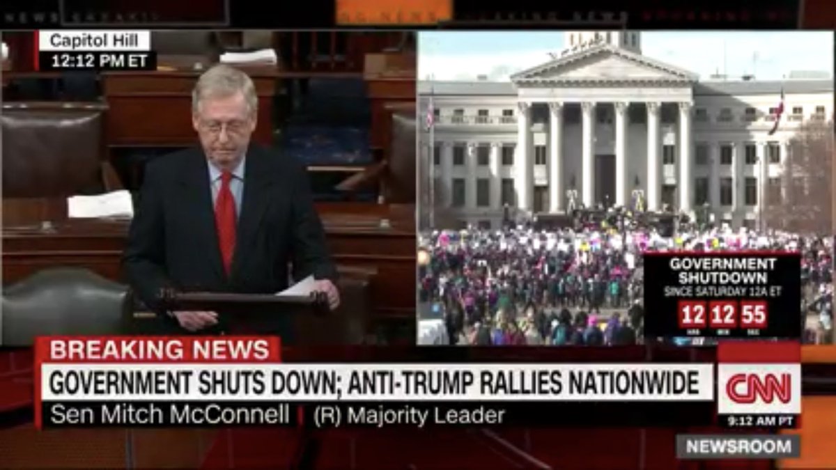 It's a split screen day. CNN banner says "GOVERNMENT SHUTS DOWN; ANTI ...