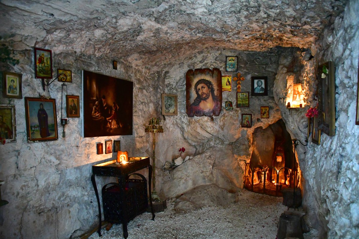 Views of the Virgin of the Cave, built near the beach of Arvanitia and ...