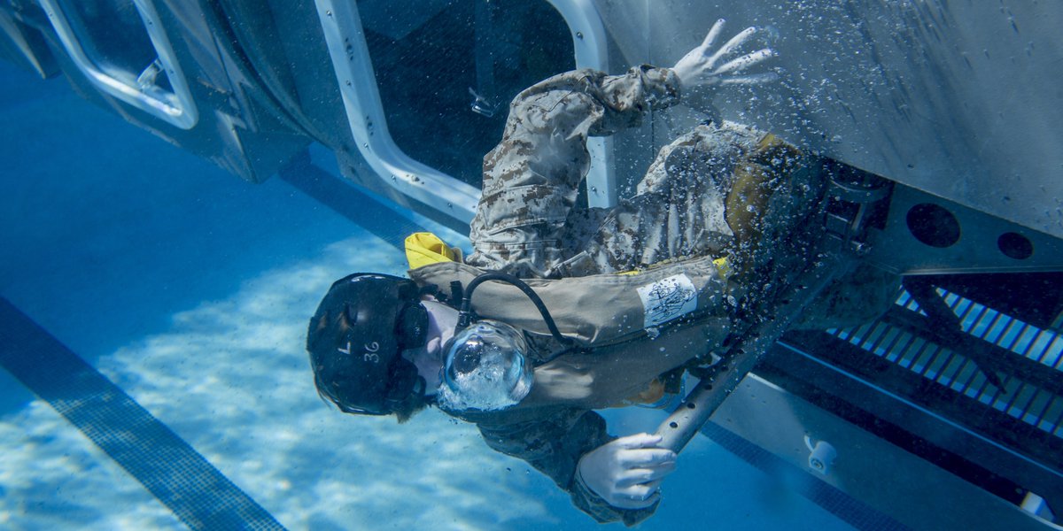 Dunk Tank Marines with the , , conduct underwater egress survival ...