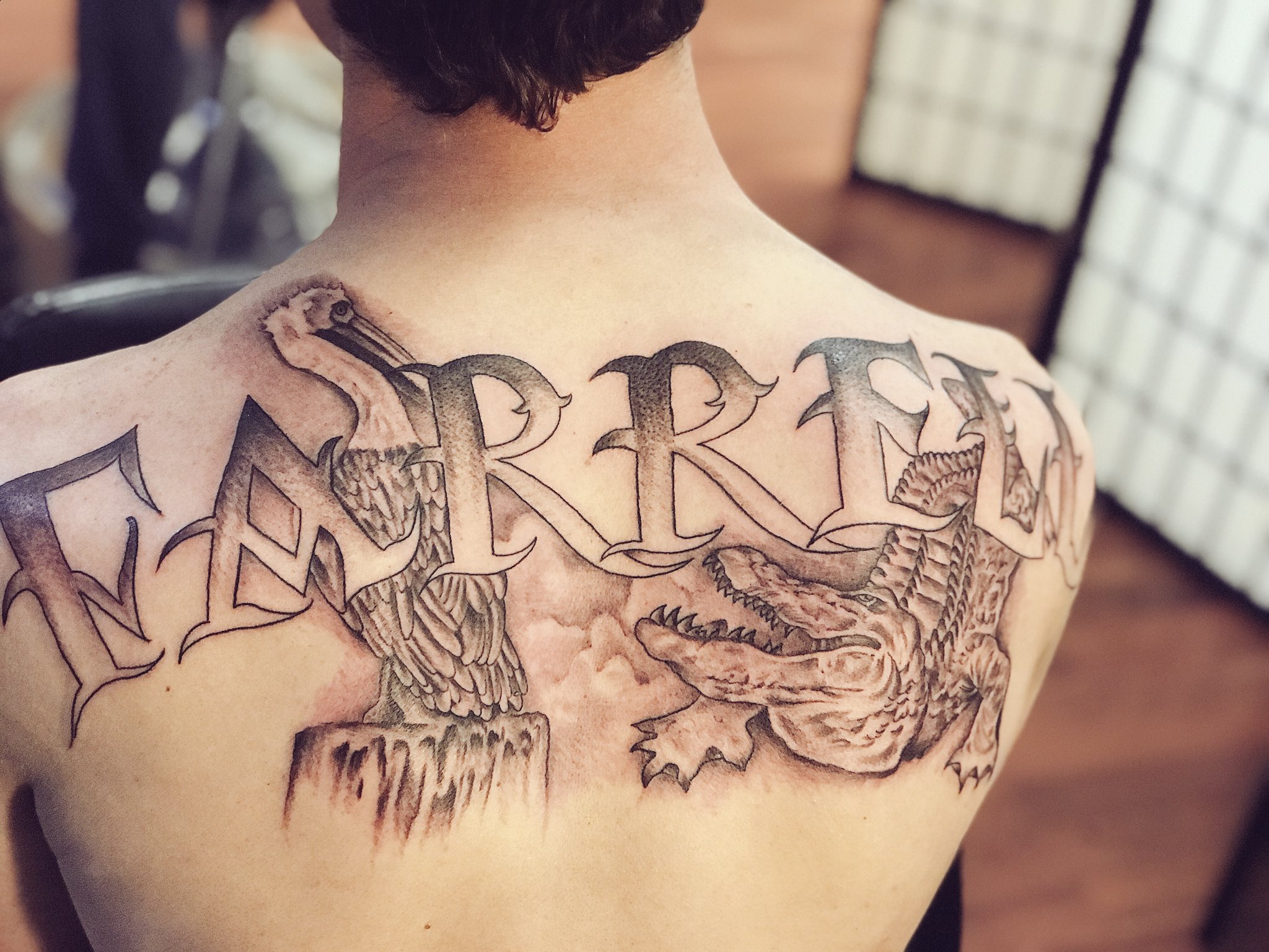 Stone Lettering Tattoo