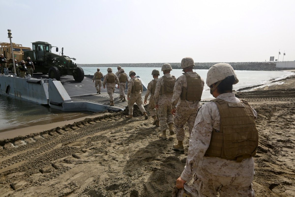 U.S. Navy Sailors with Amphibious Construction Battalion 1 and U.S ...