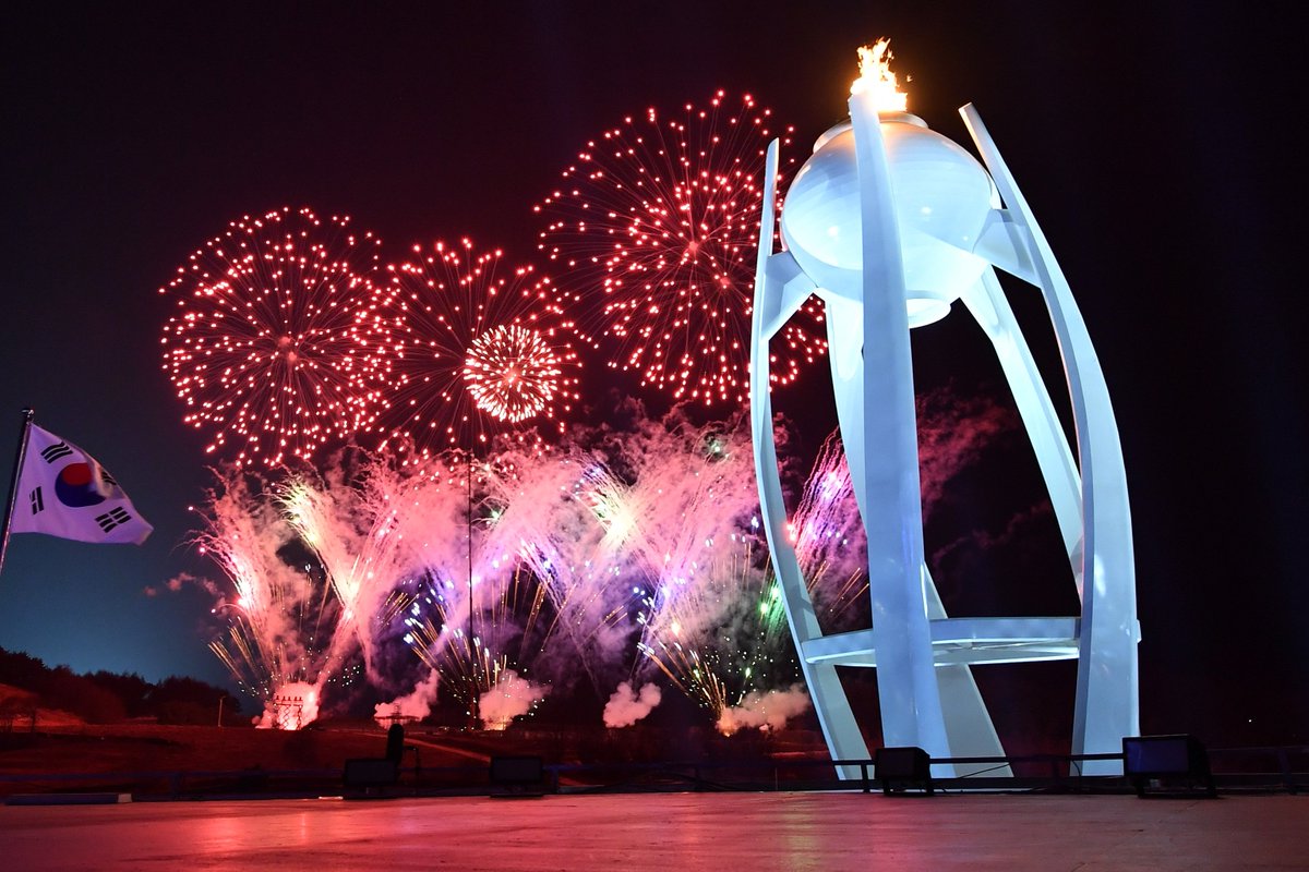 The olympic flame is extinguished by a beautiful light display of ...