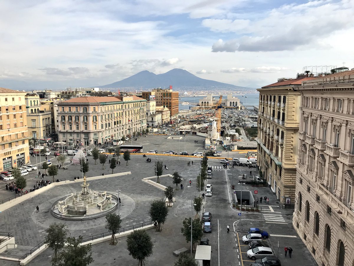 Naples, Piazza municipio with mount Vesuvius in the background via ...