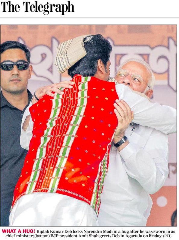 Another one of Modi's awkward hugs. This time he's on the receiving end ...