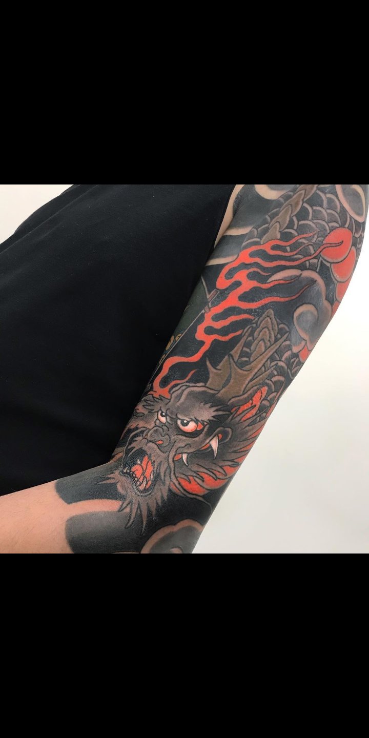 Red Dragon Arm Tattoo