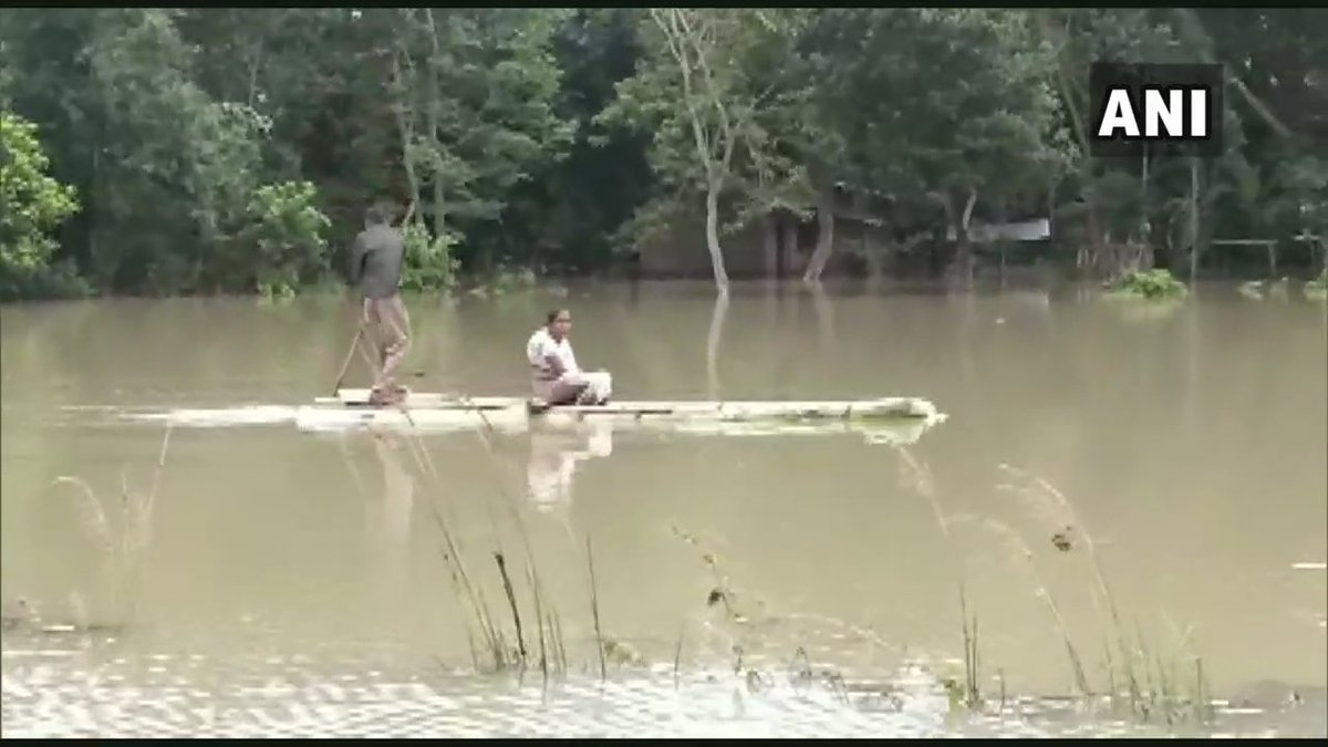 Kampur Guimari: Assam: Kampur Guimari village flooded after the level ...