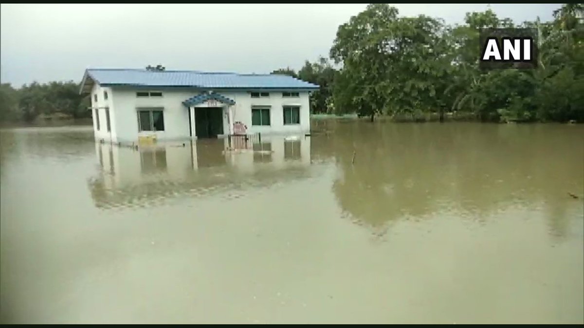 Kampur Guimari: Assam: Kampur Guimari village flooded after the level ...