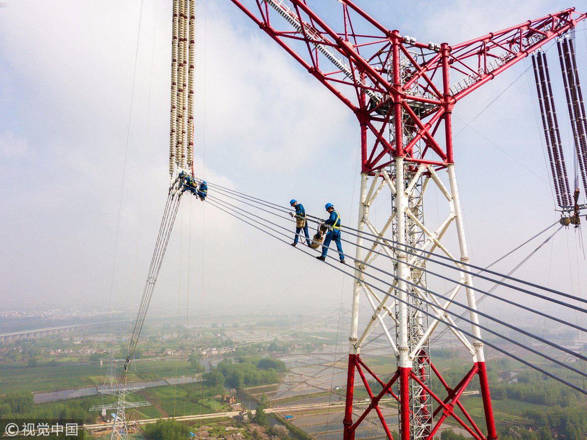 China on Sunday finished installing a UHV transmission line across the ...