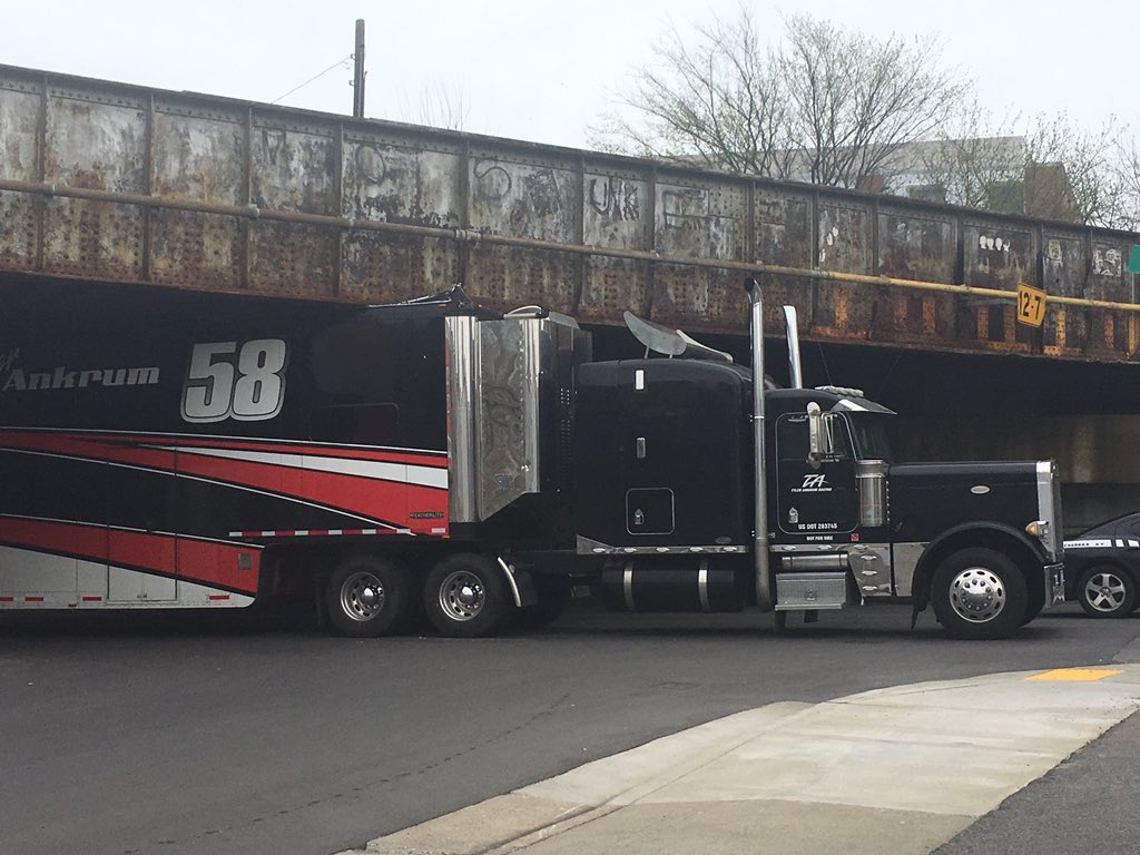 Race car hauler stuck under a bridge in Nashville : r/NASCAR