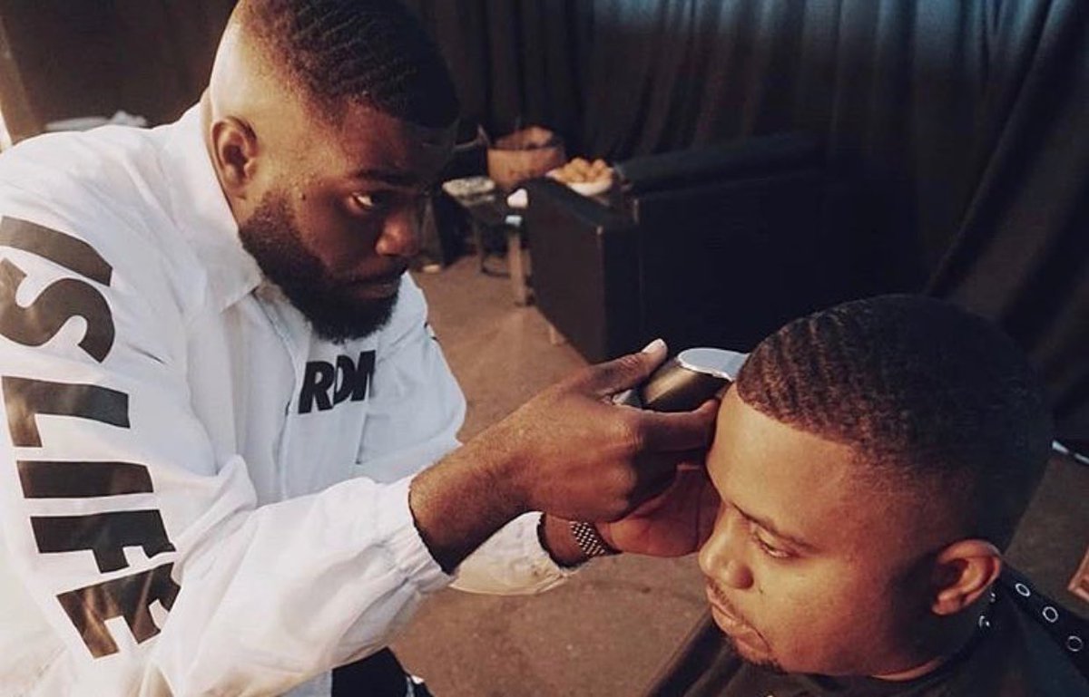 Nas Fade Haircut With Part