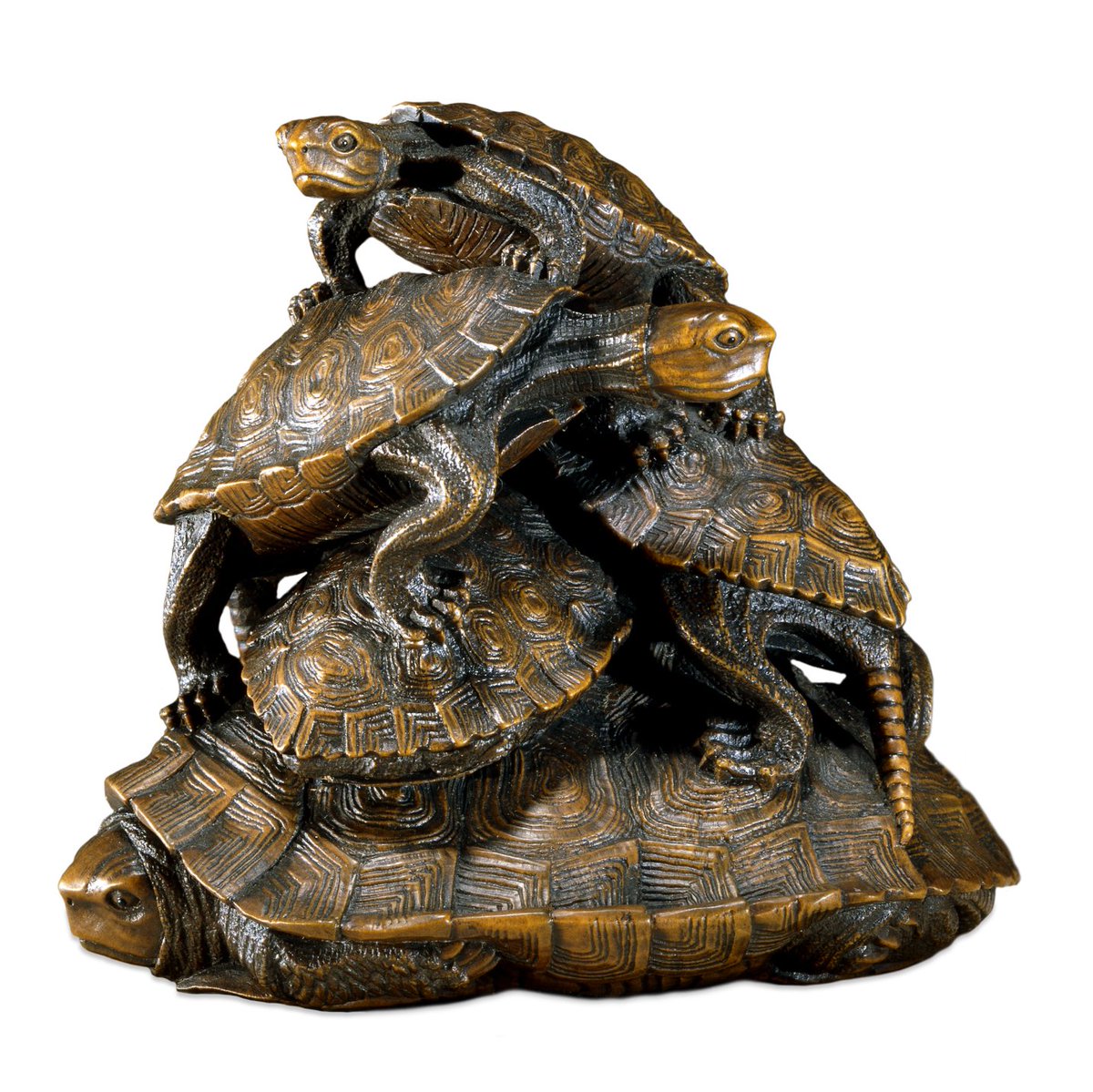 This small wooden sculpture of turtles was made in Kyoto, Japan in the ...