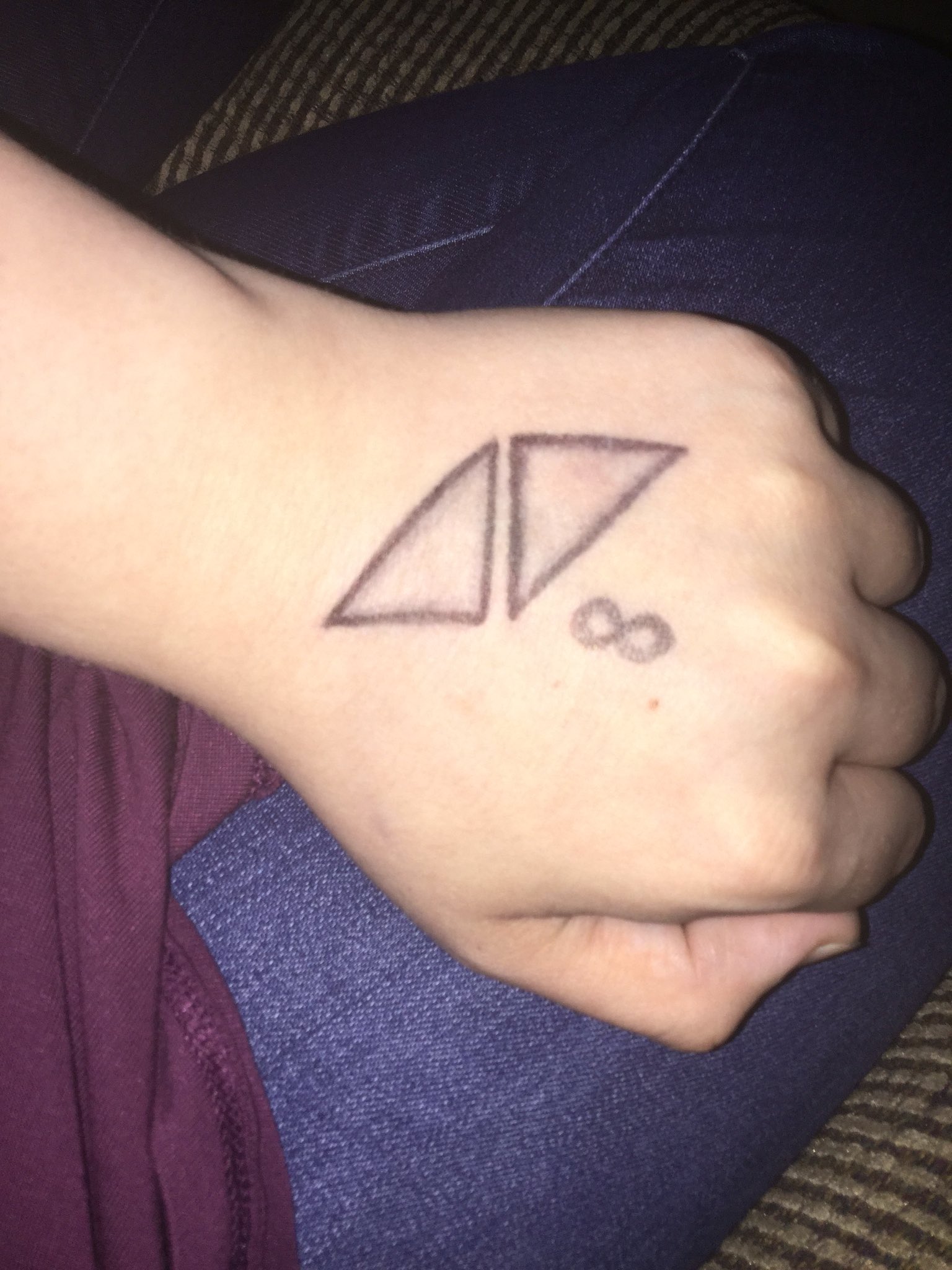 Avicii Symbol Meaning