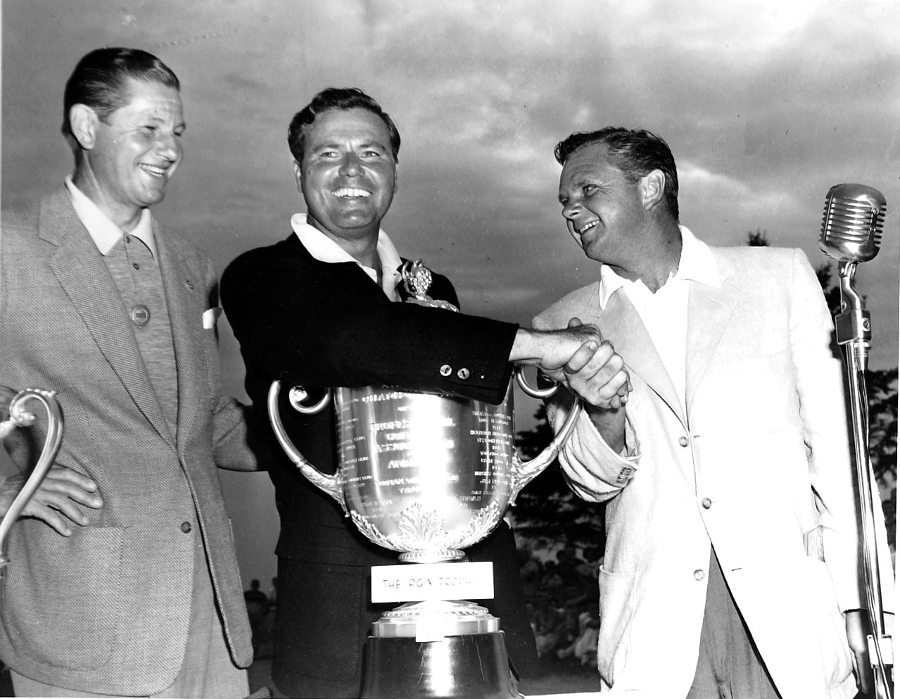 White Runner Holding Trophy