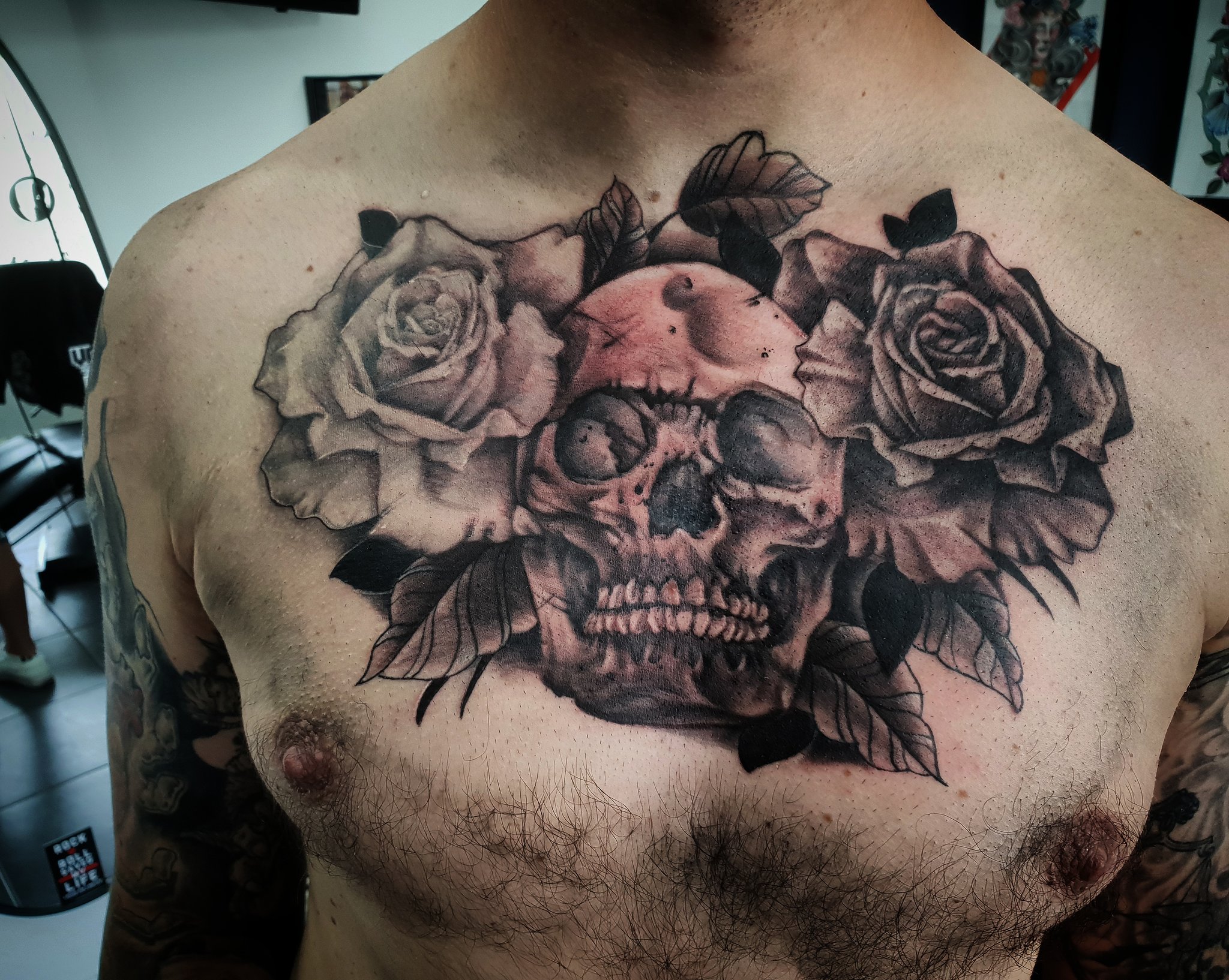 Skull And Roses Chest Tattoo