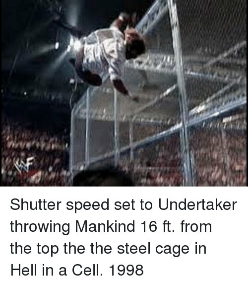 Undertaker Throws Mankind Off Cell