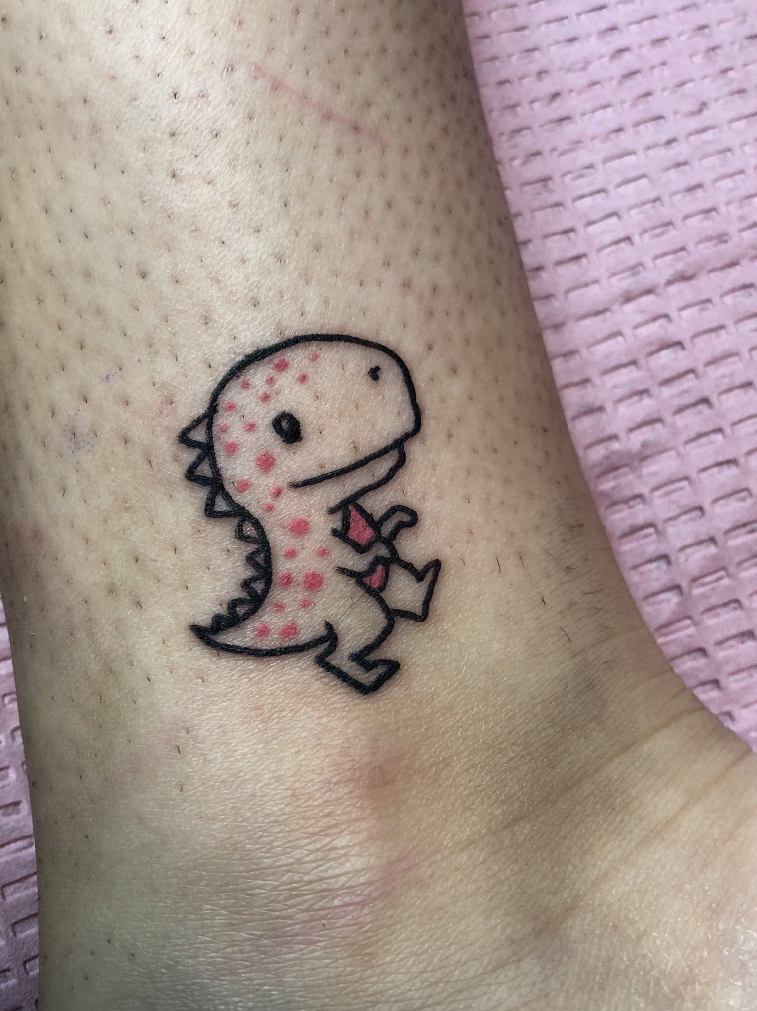 Simple Dinosaur Tattoo