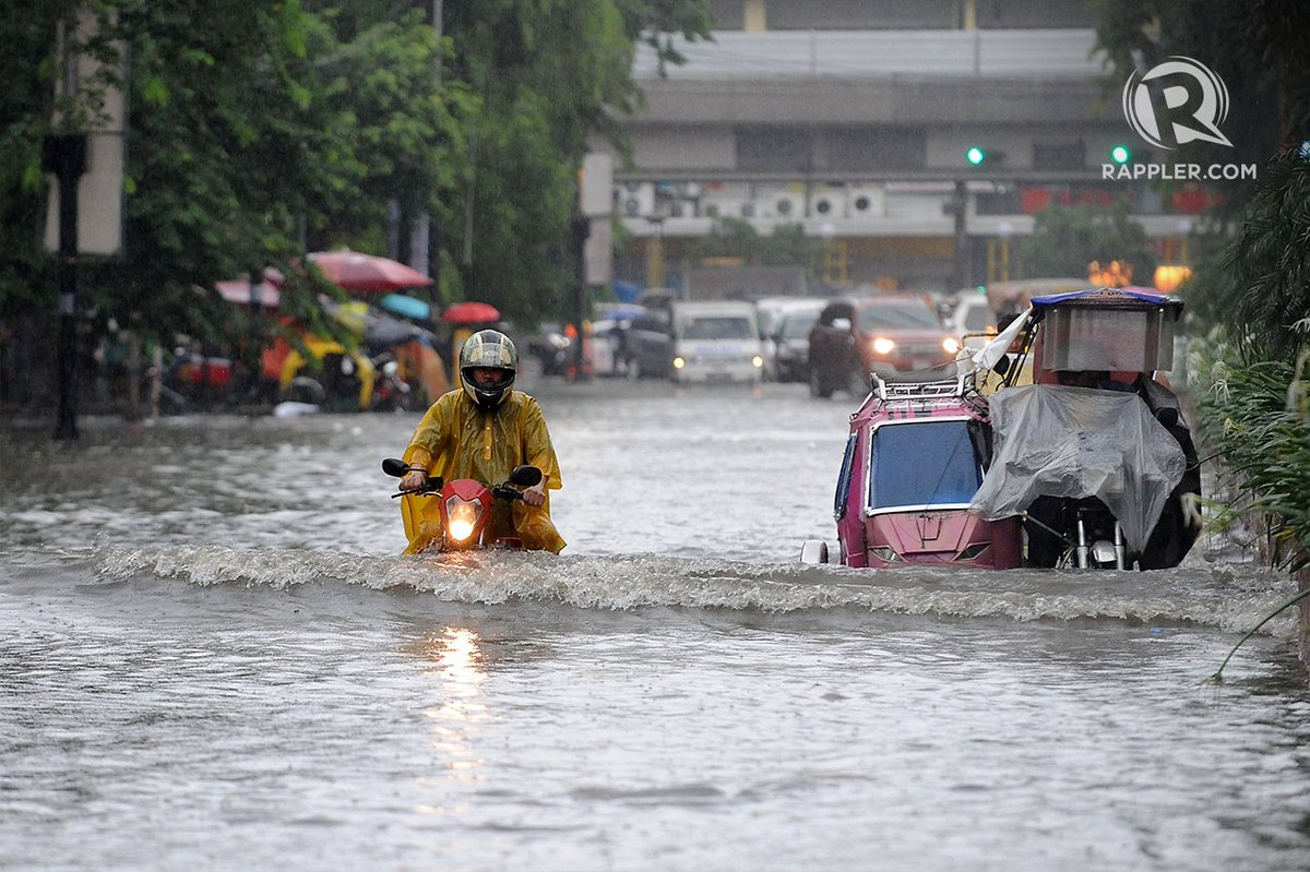 Commuters and motorists brave the flooding at various point in manila ...