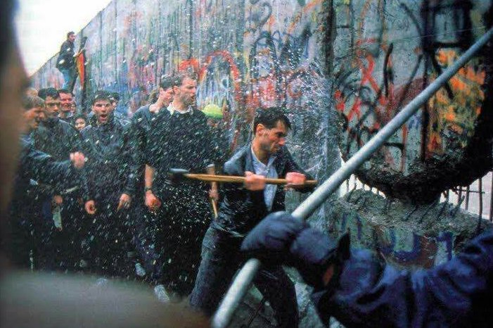 Berlin Wall Being Knocked Down