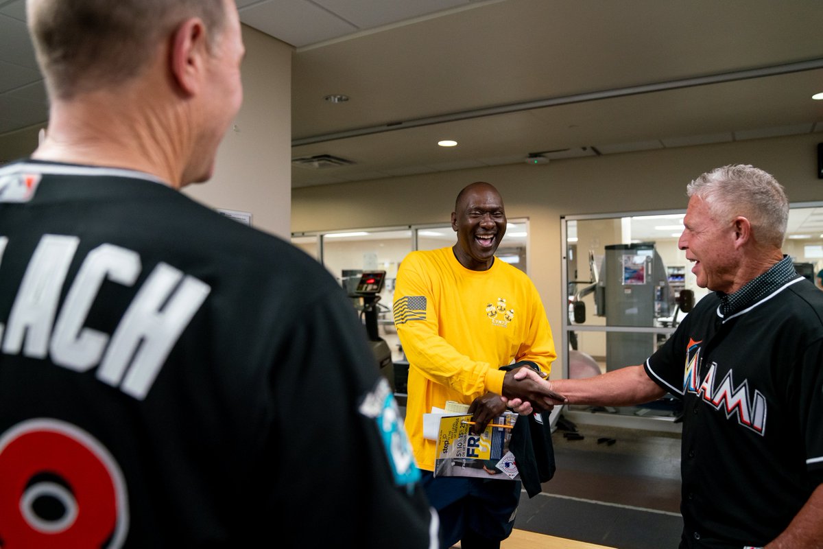 Several Marlins players, manager Don Mattingly, coaches, and front ...